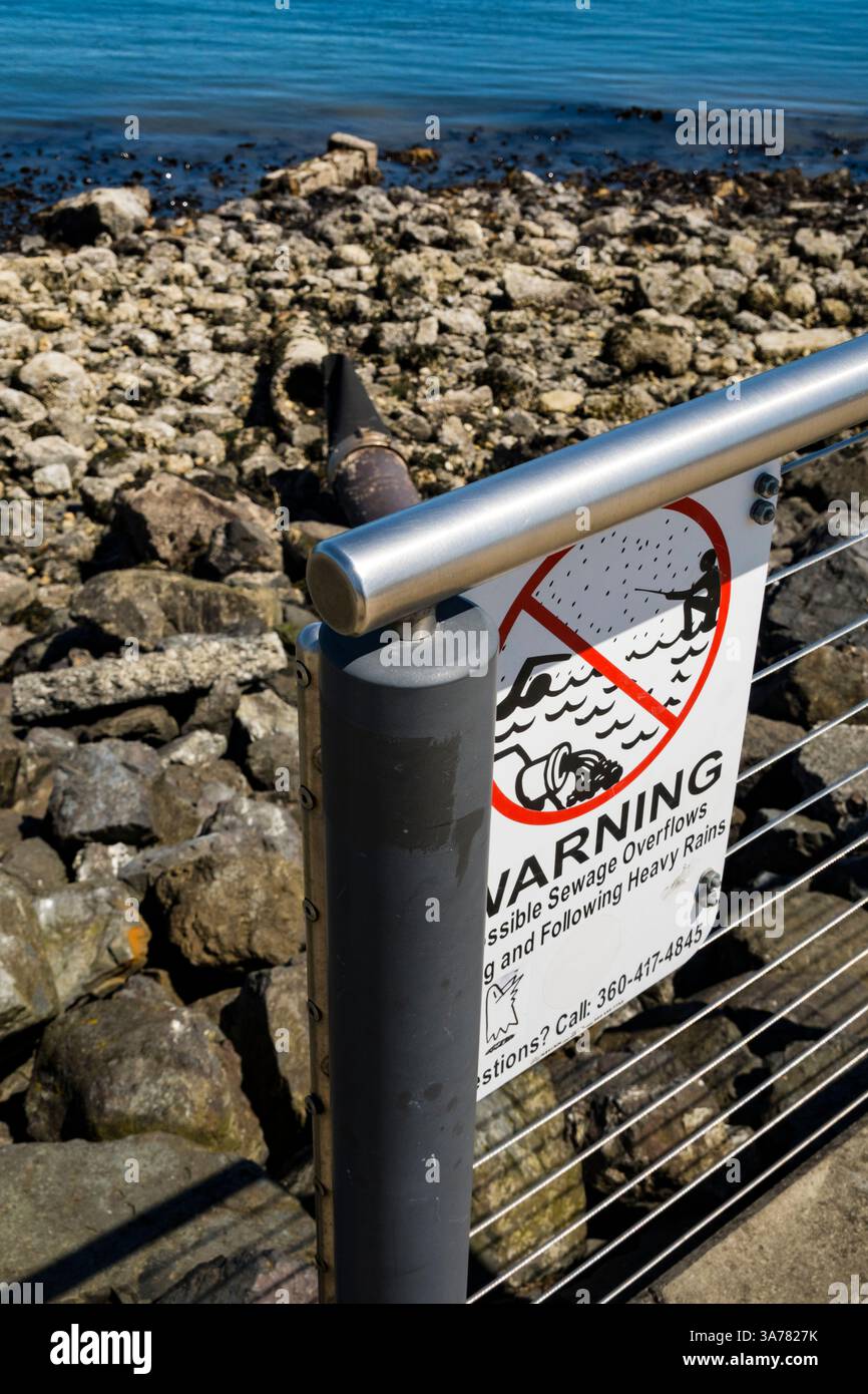 Warning sign for sewage outflow pipe on the Port Angeles waterfront ...