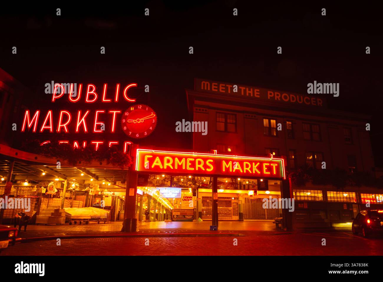 Pike Place Market, Seattle at night, neon signs and empty stalls at the ...