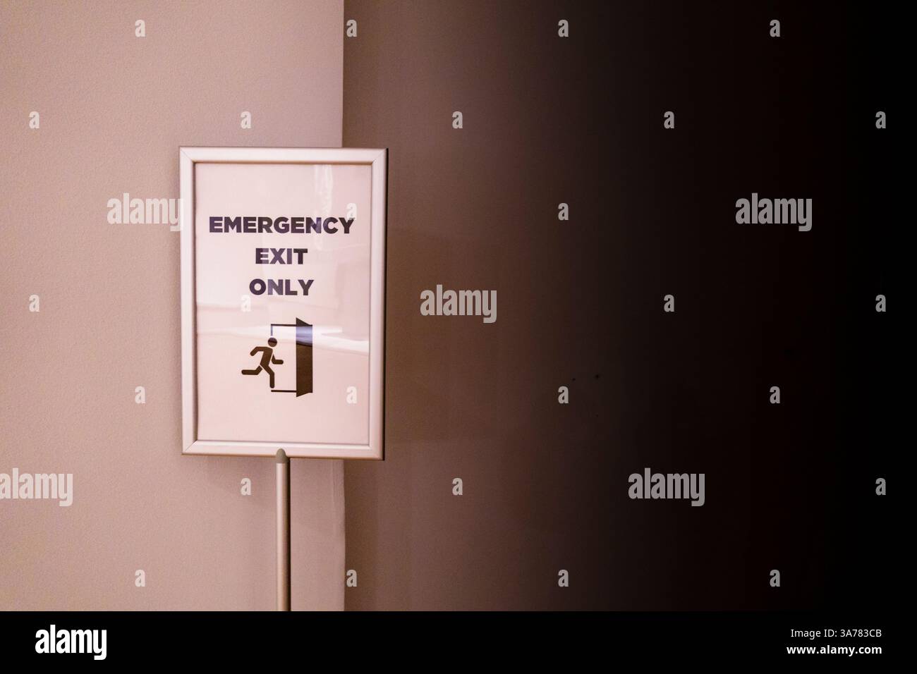 Emergency Exit sign in a building Stock Photo - Alamy