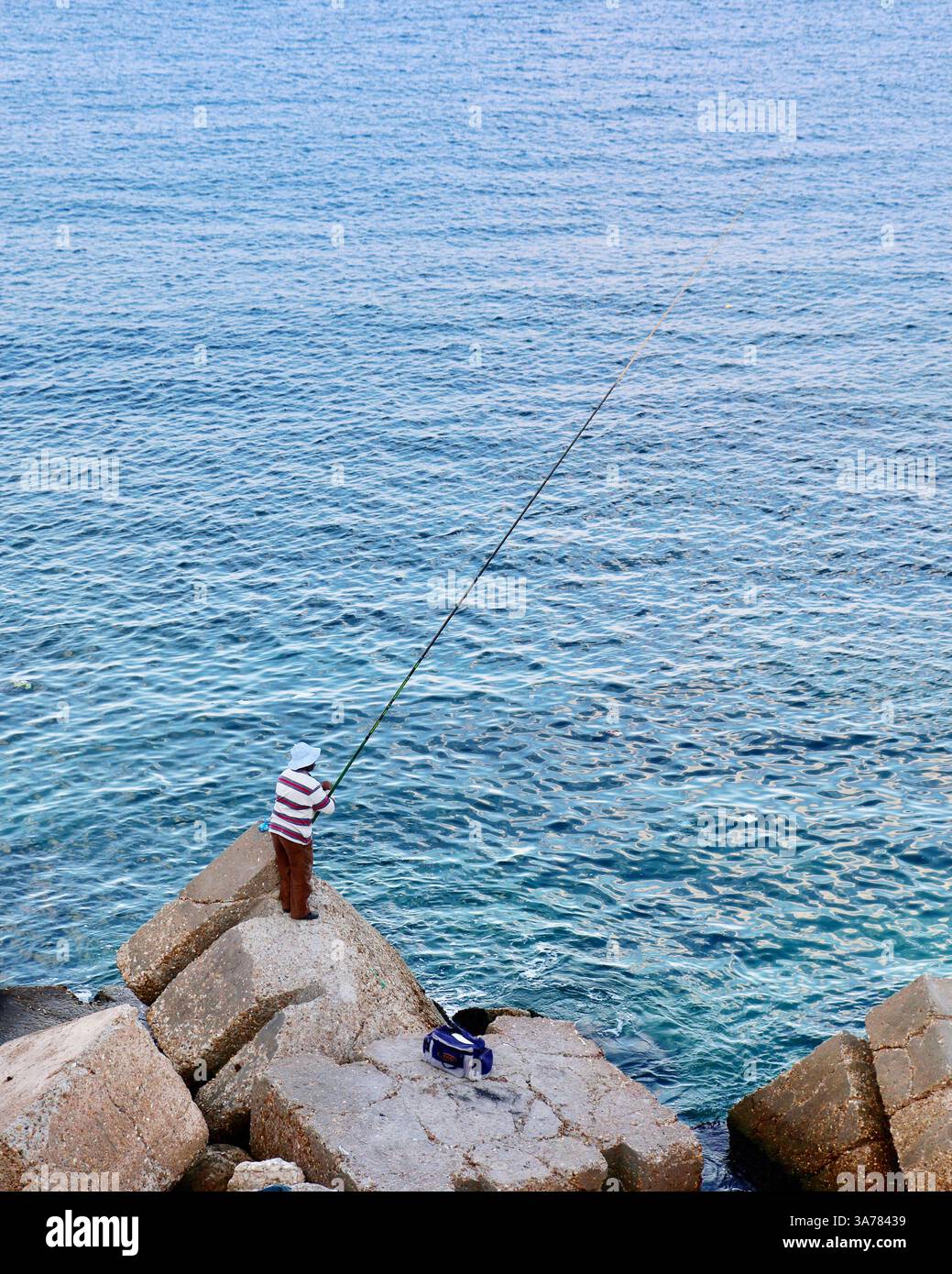 Man fishing in Alexandria - Egypt Stock Photo - Alamy