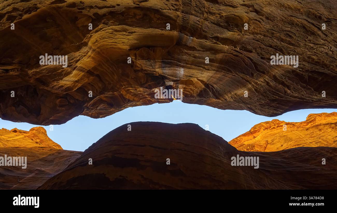 road through the Siq Gorge, canyon, the symbol of the city of Petra, at ...