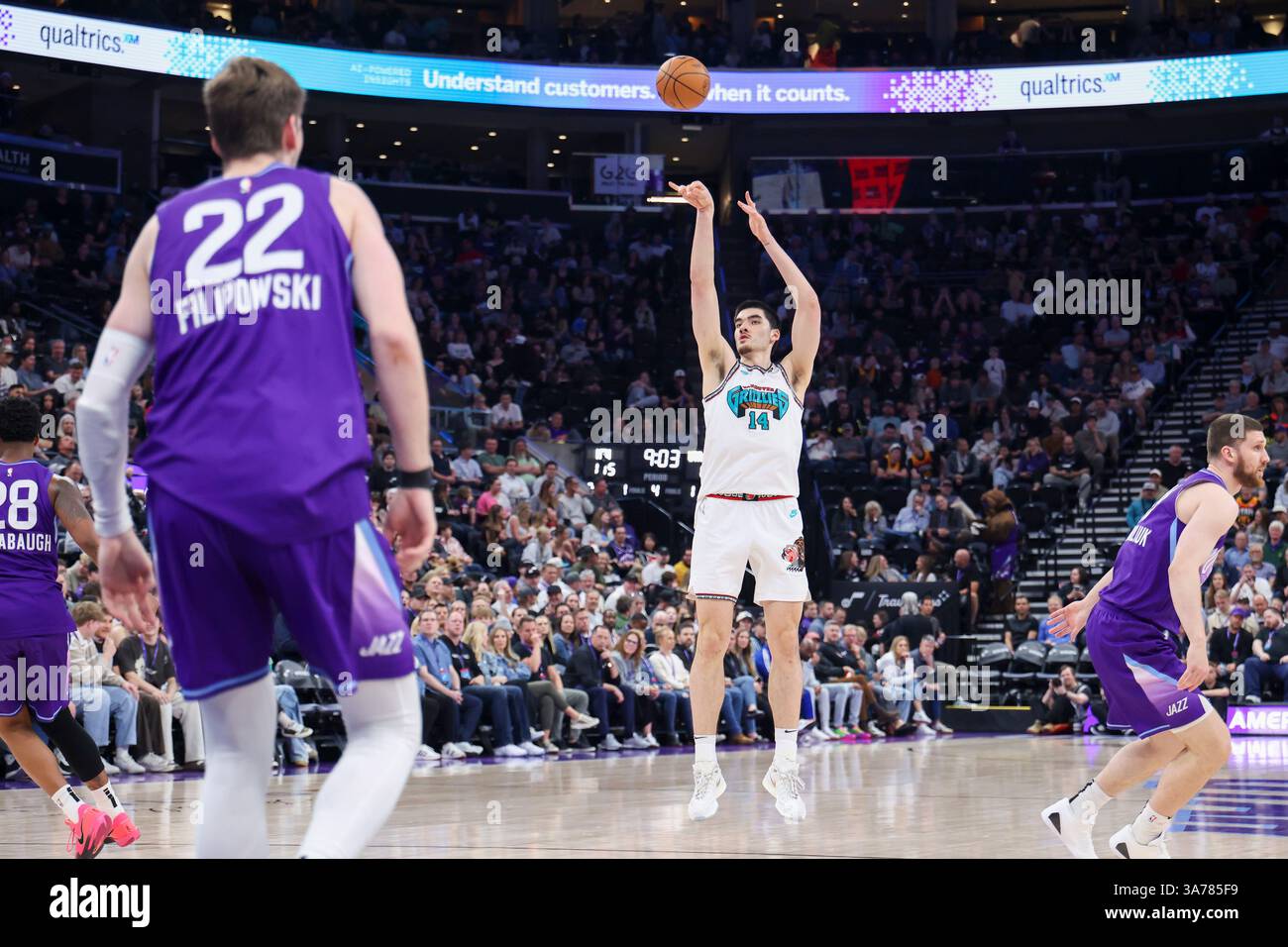Memphis Grizzlies center Zach Edey (14) shoots a three-point shot ...