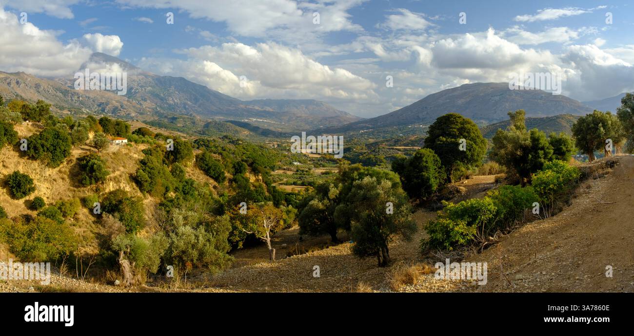 Here's a caption for the image: "A panoramic view captures the rugged ...