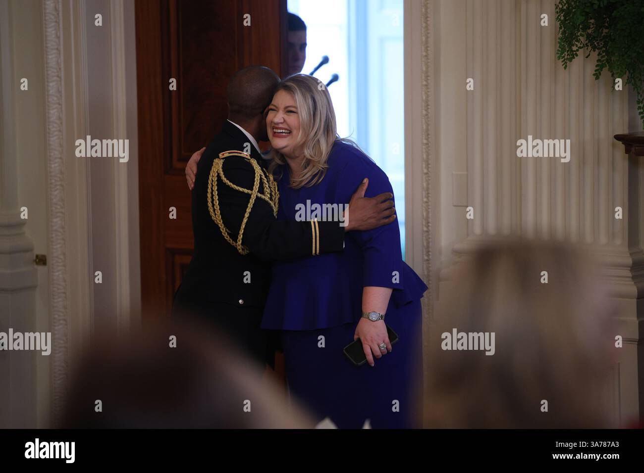 Rep. Kat Cammack, right, is embraced as she arrives for a Women’s ...