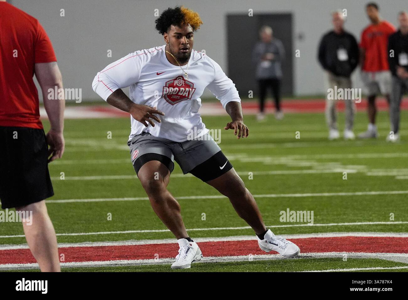 Ohio State offensive lineman Josh Simmons participates in a drill ...