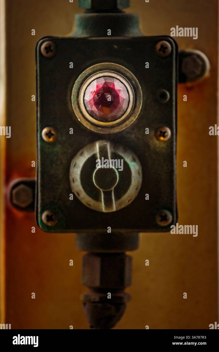 Controller, a light and a movable dial on a metal box on the Walla ...