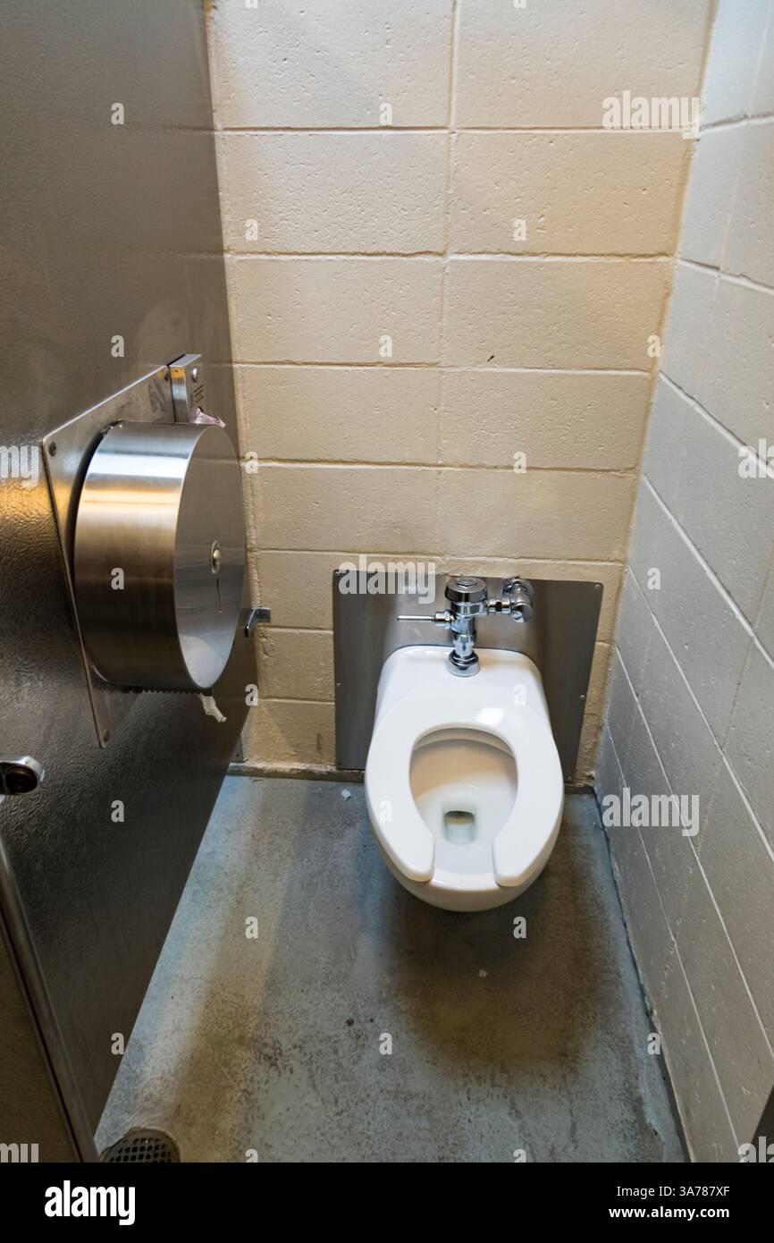 A public restroom cubicle, a toilet at a reststop on a major road Stock ...