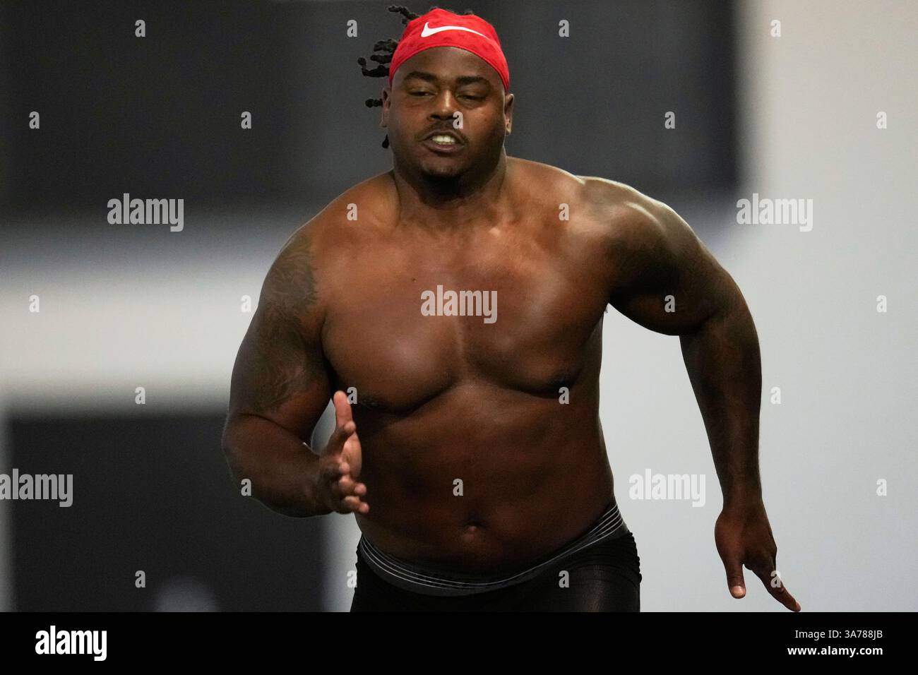 Ohio State defensive lineman Ty Hamilton runs the 40-yard dash during ...