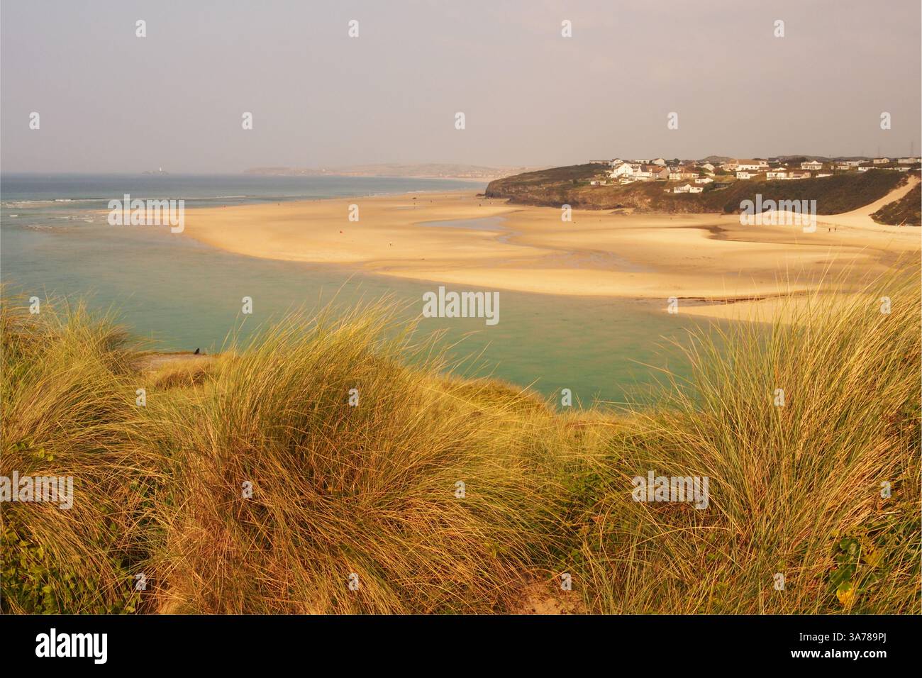 A view looking across Porthkidney Sands to Hayle beach, snad dunes and ...