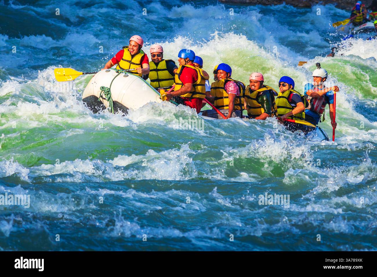 people enjoying river rafting in Rishikesh India on Ganges river Stock ...