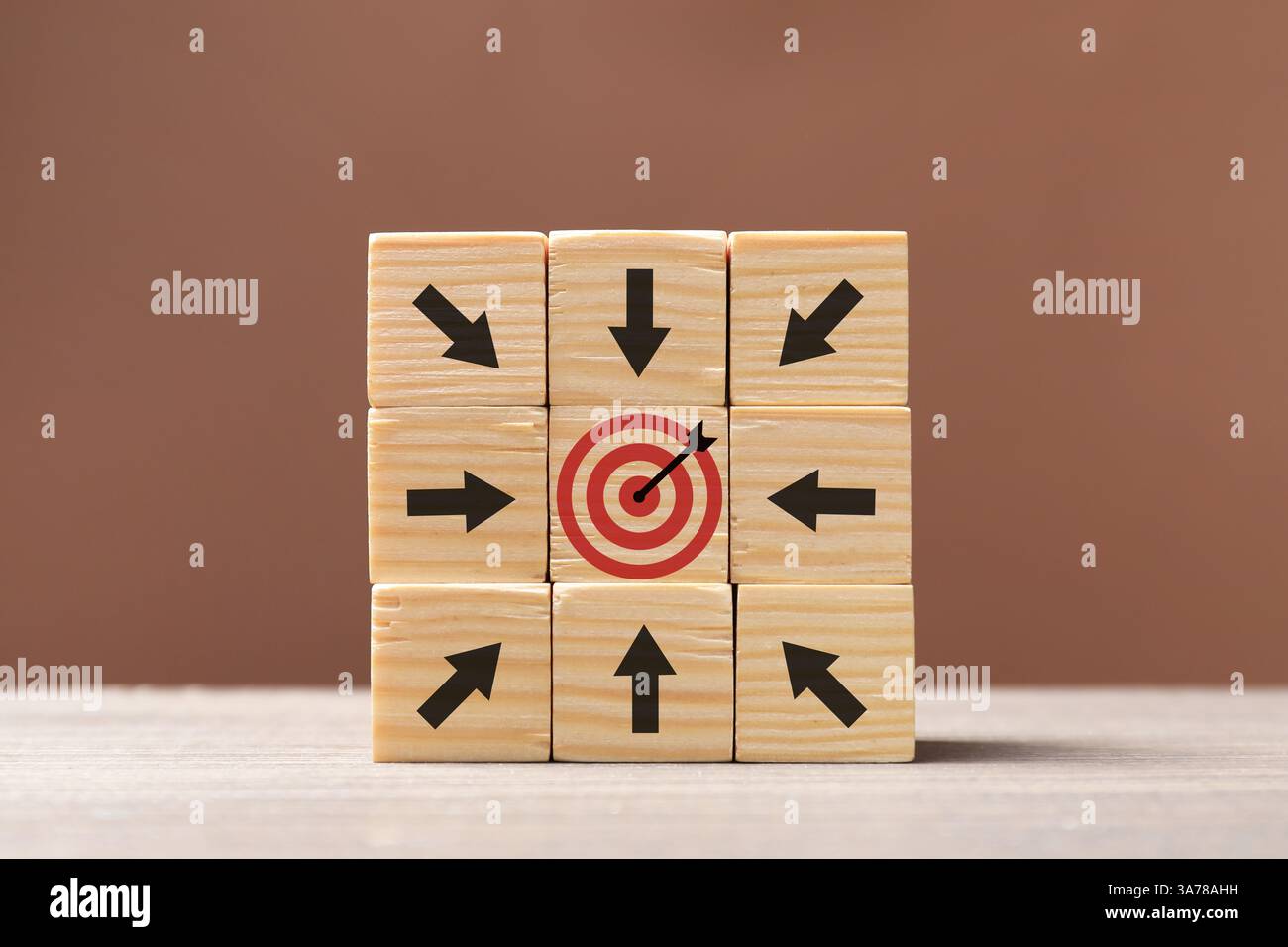 Targeting. Stacked cubes with arrows pointing at one with bullseye ...