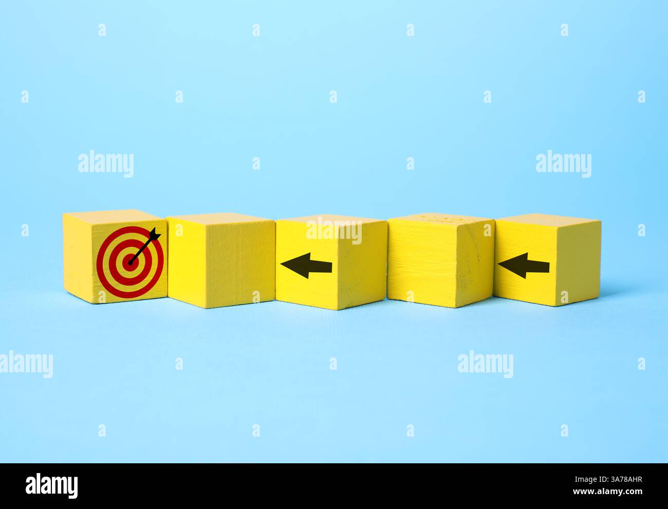 Targeting. Cubes with arrows pointing at one with bullseye on light ...