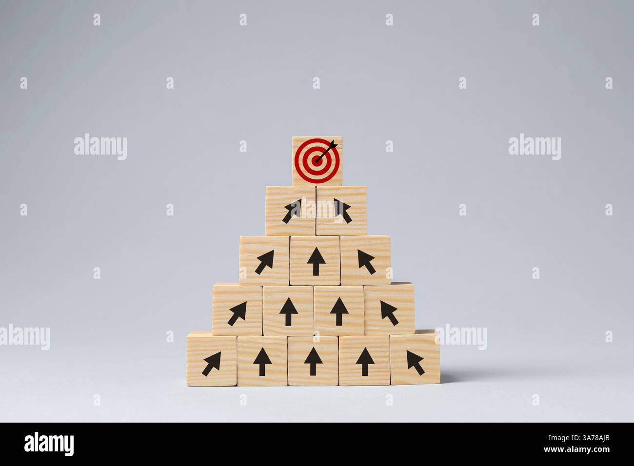 Targeting. Pyramid of cubes with arrows pointing at one with bullseye ...