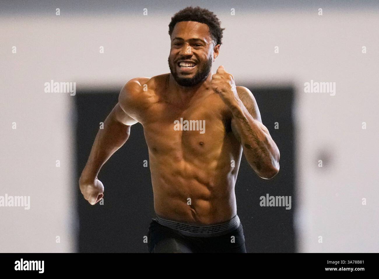 Ohio State cornerback Jordan Hancock runs the 40 during the school's ...