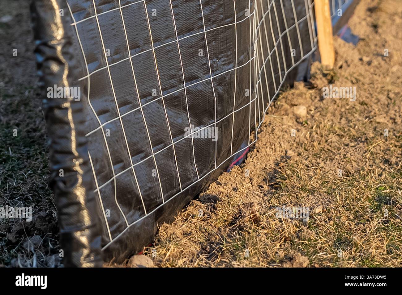 Silt Fence fabric with wire mesh and wooden posts installed prior to ...
