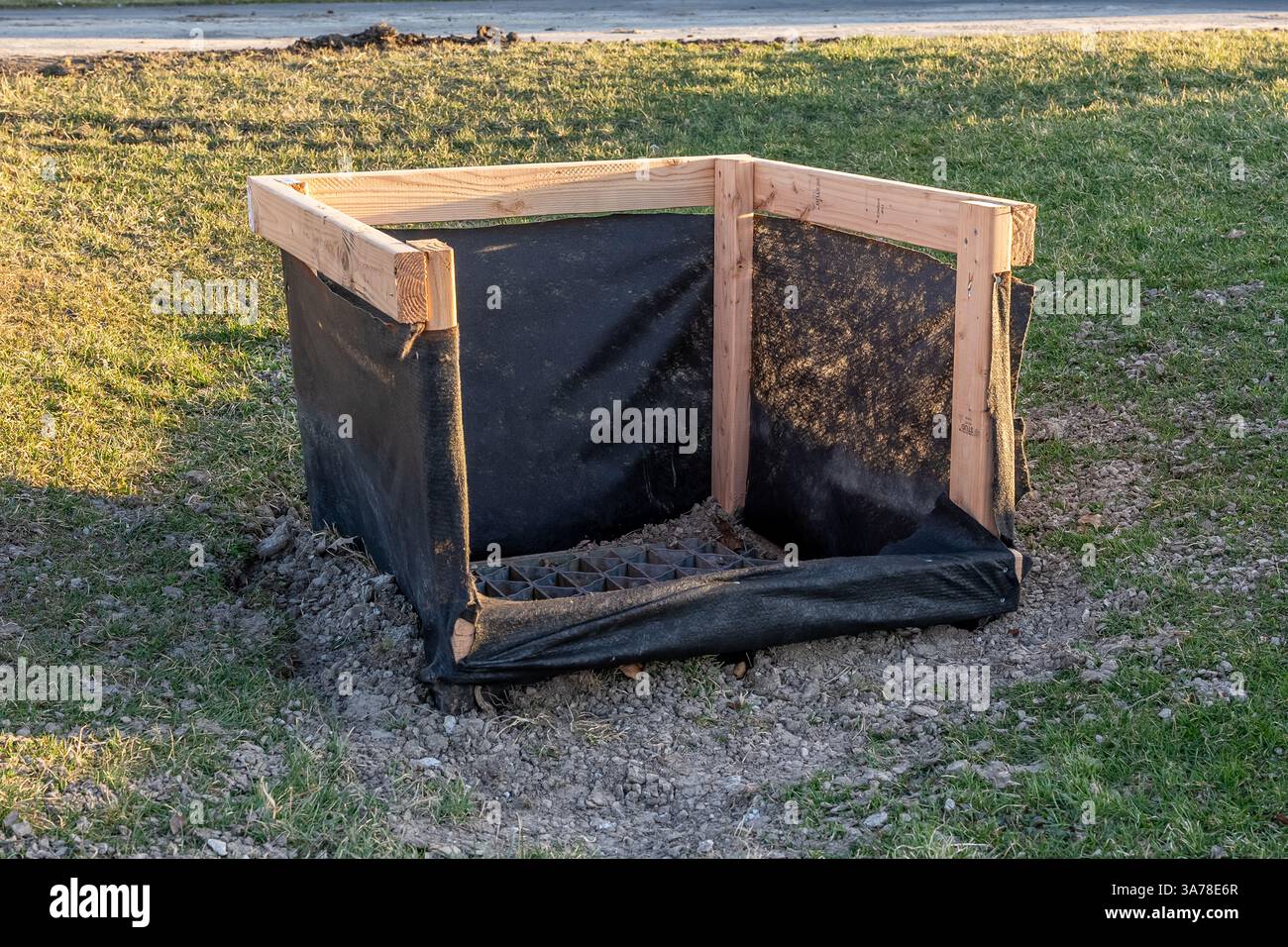 Photo of temporary silt fence, silt trap, around a storm inlet on a ...