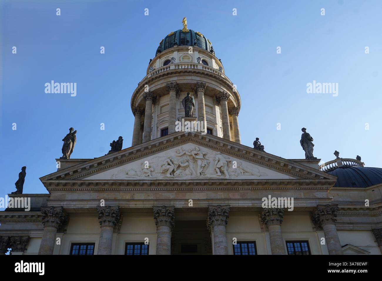 Frontal upward view of Deutscher Dom (German Cathedral or Neue Kirche ...