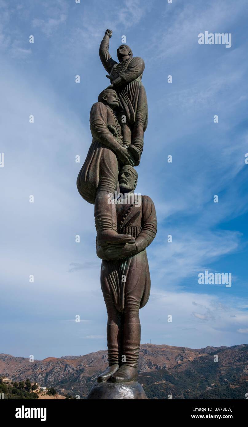 Here's a caption for the image: This bronze statue depicts three Cretan ...
