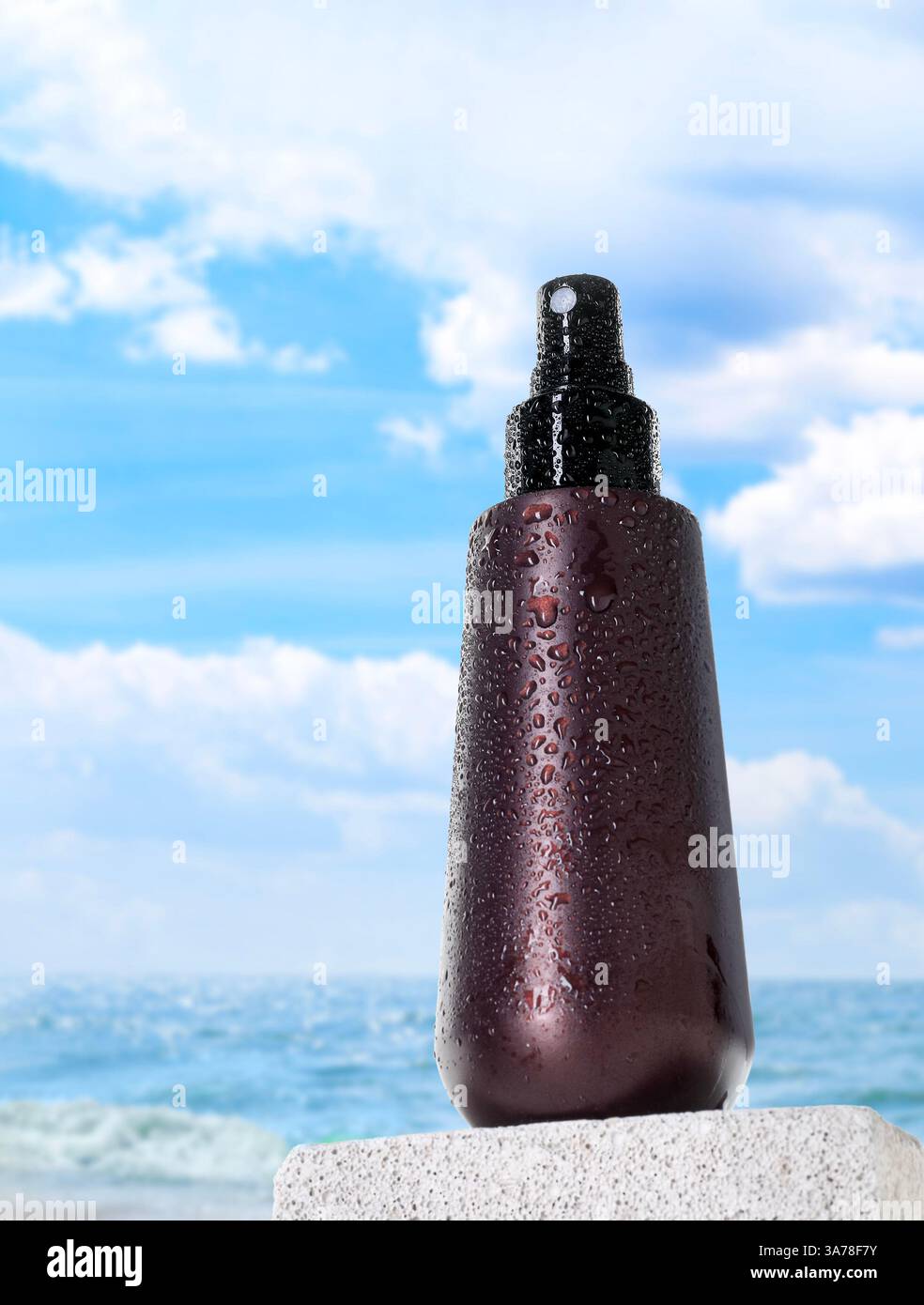Bottle of sunscreen product on beach near sea Stock Photo - Alamy
