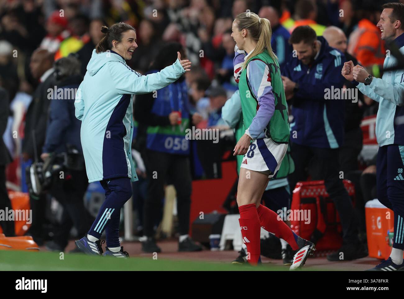 London, UK. 26th Mar, 2025. Renne Slegers (L), head coach of Arsenal ...