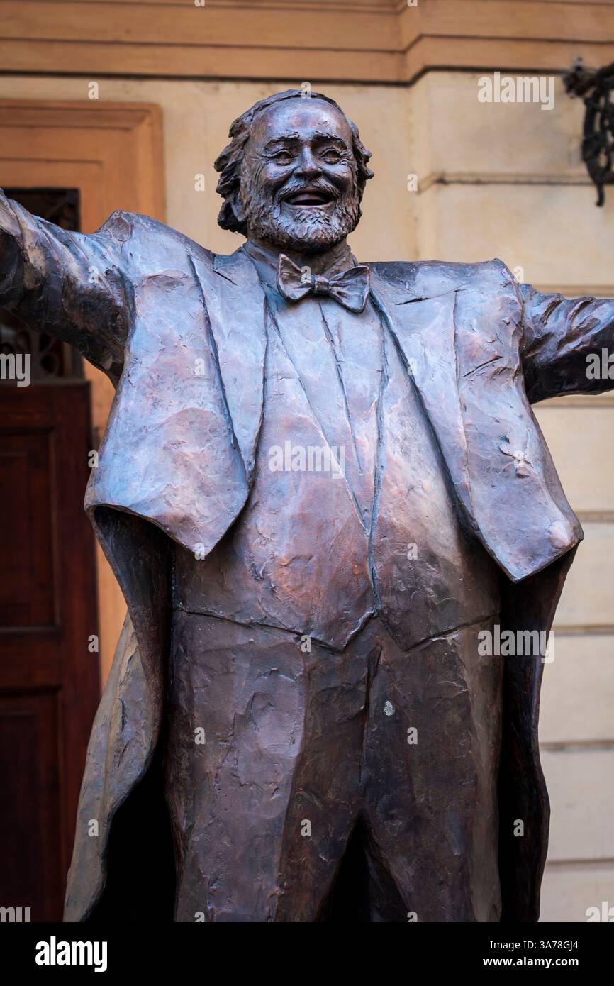 Modena, Italy. The Bronze Statue dedicated to the great citizen Luciano ...