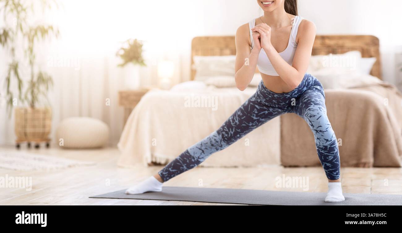 Home Aerobics. Sporty Asian Woman Doing Lunges Exercises On Mat In ...