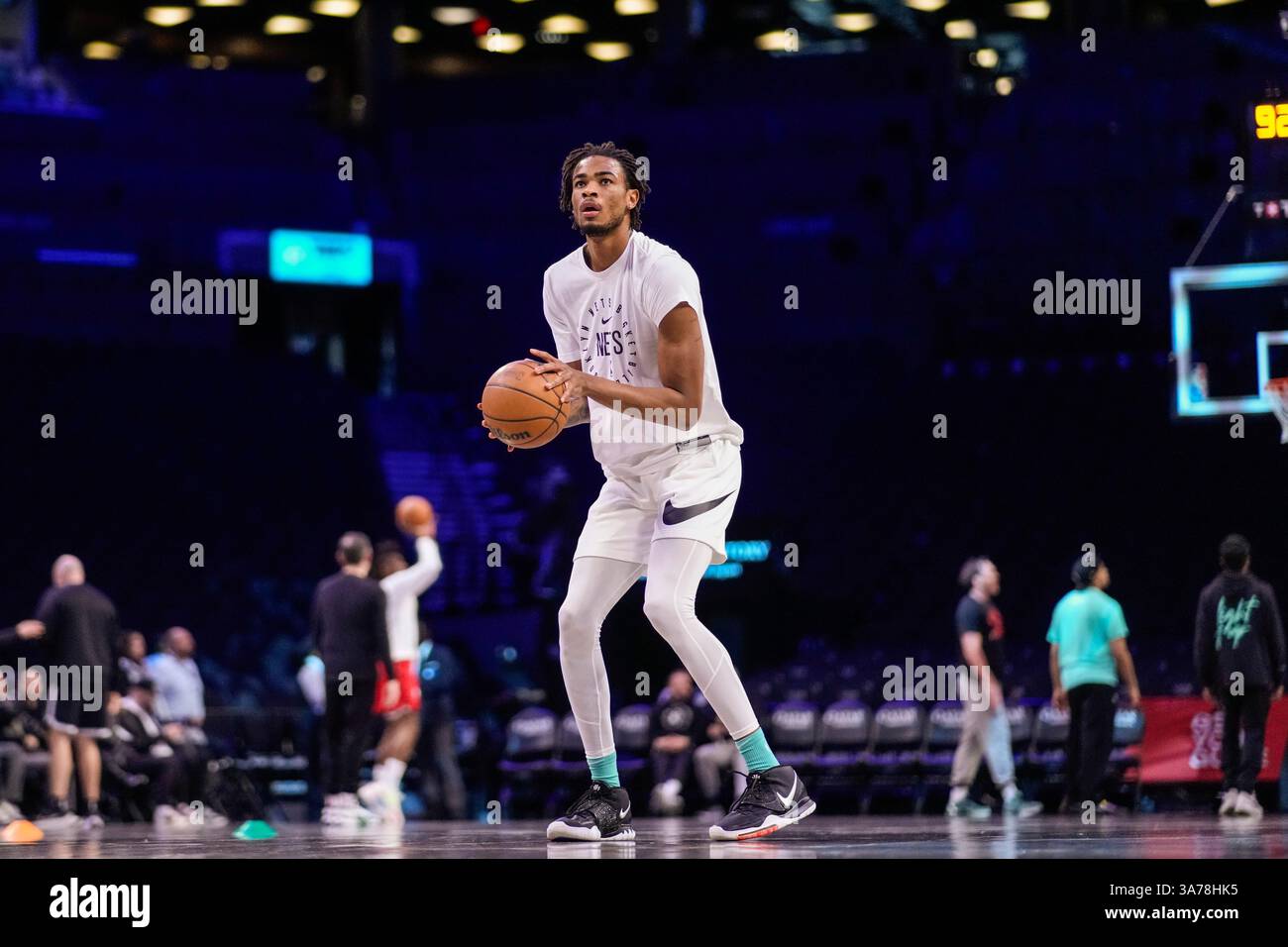 Brooklyn Nets center Nic Claxton warms up before an NBA basketball game ...