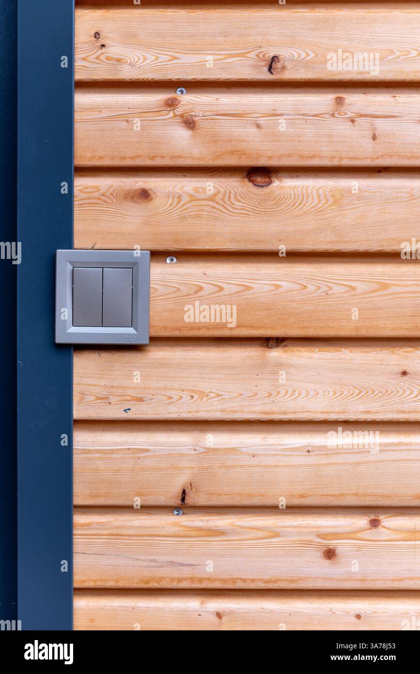 modern gray double light switch on the wall of wooden house Stock Photo ...