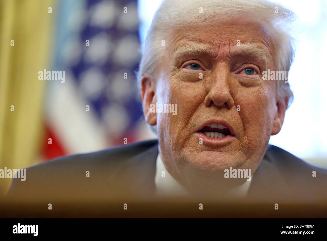 President Donald Trump speaks to reporters in the Oval Office at the ...