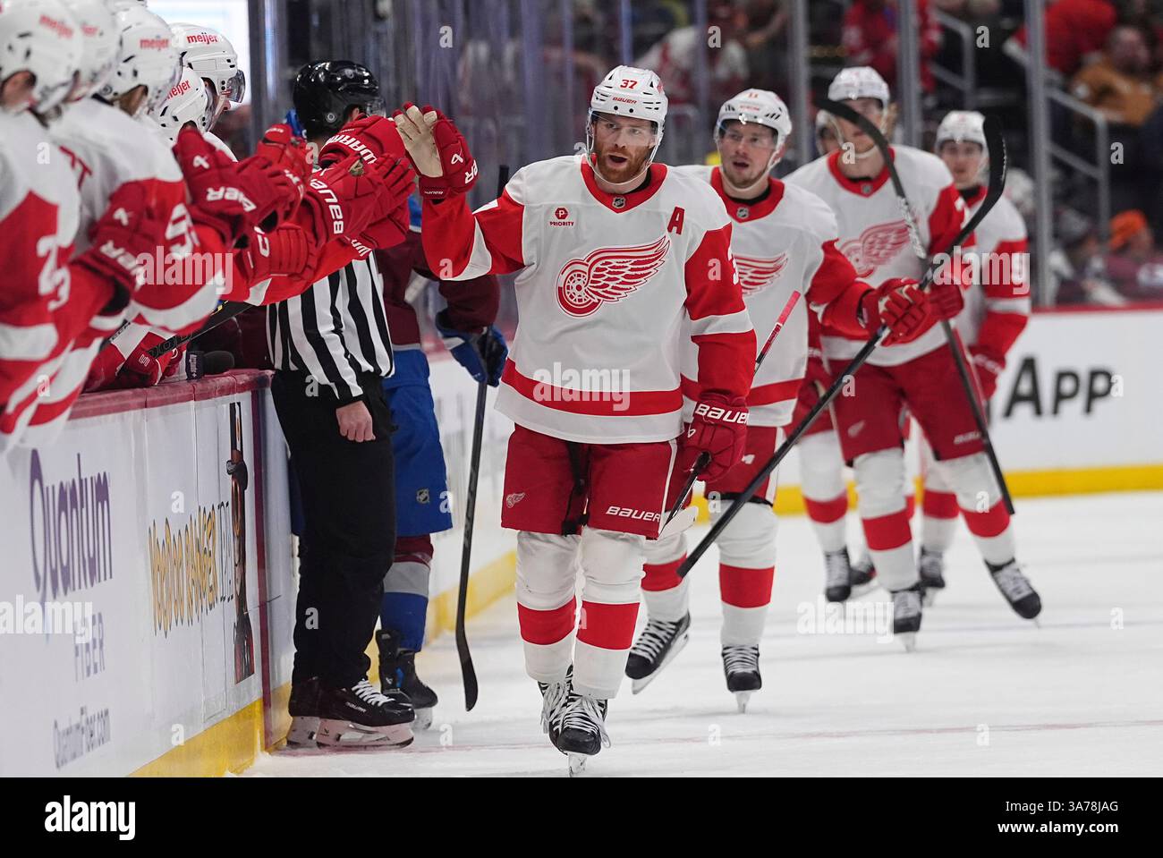 Detroit Red Wings left wing J.T. Compher (37) is congratulated as he ...