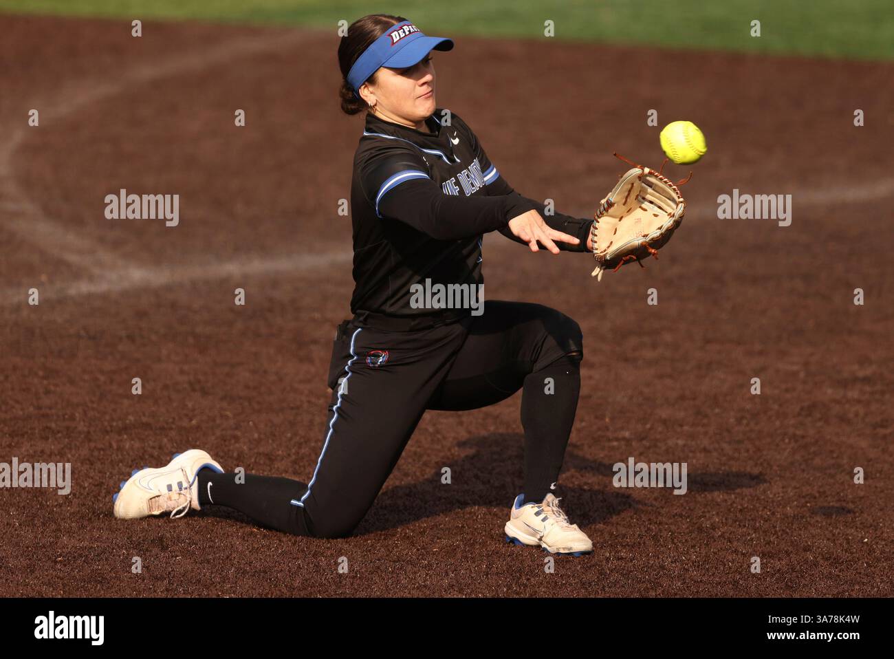 DePaul Baylee Cosgrove (1) throws to first base during an NCAA softball ...