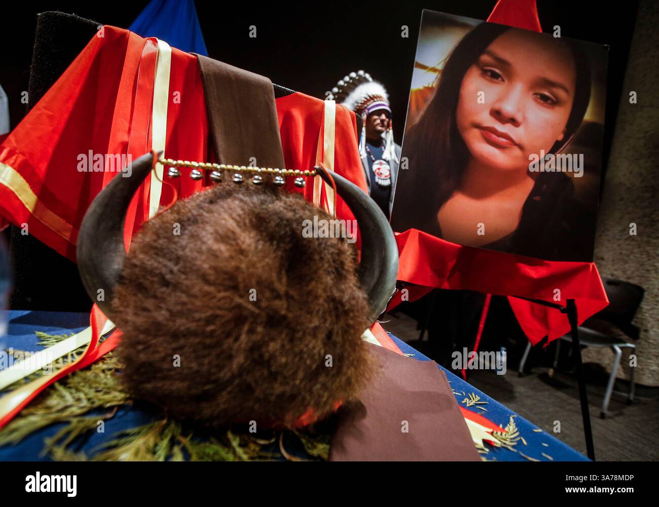 A portrait of missing person Ashlee Christine Shingoose sits on display ...