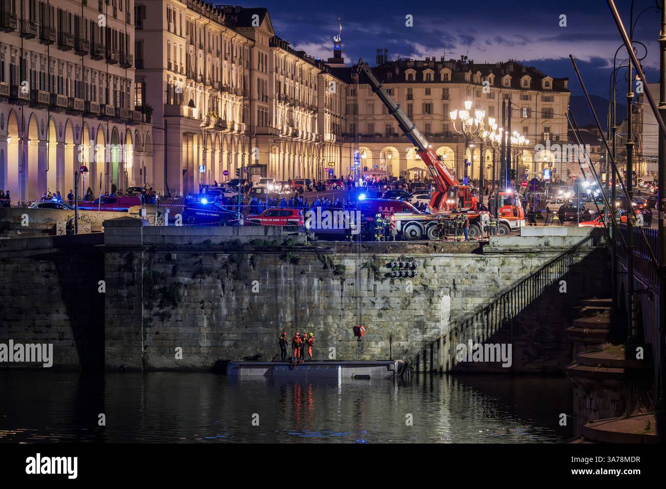 Turin, Italy. 26 March 2025. Firefighters work during the recovery ...