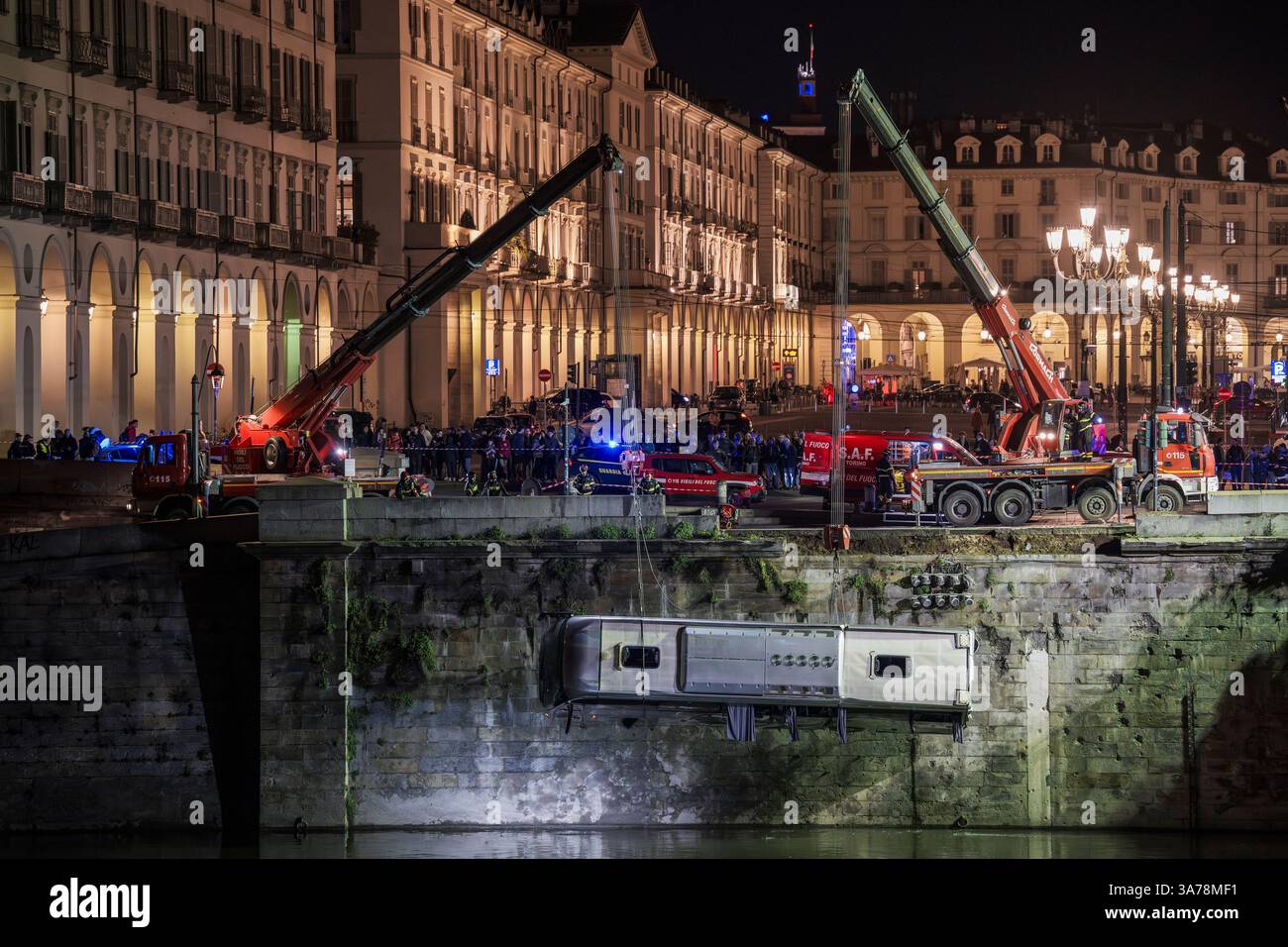 Turin, Italy. 26 March 2025. Firefighters work during the recovery ...