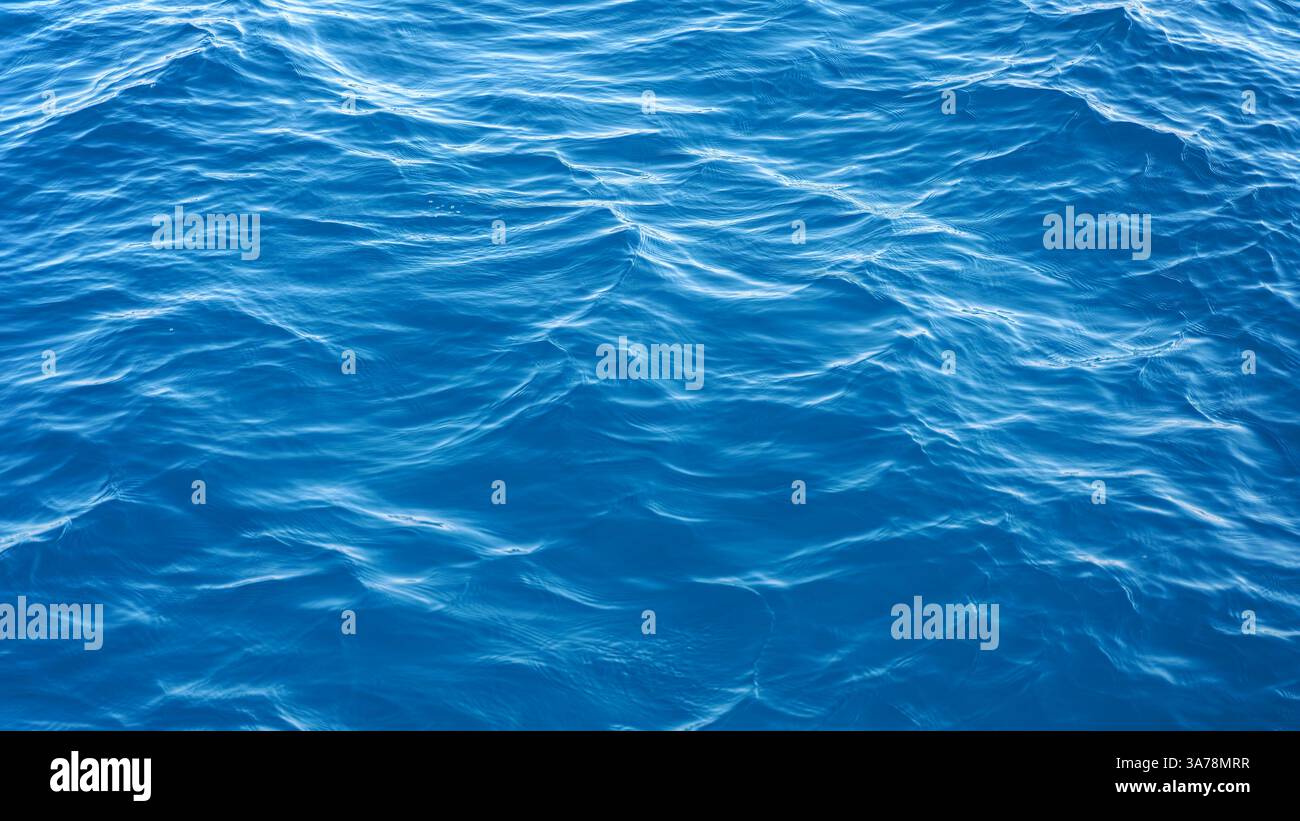 Rough deep turquoise and blue Red sea with blue texture background ...