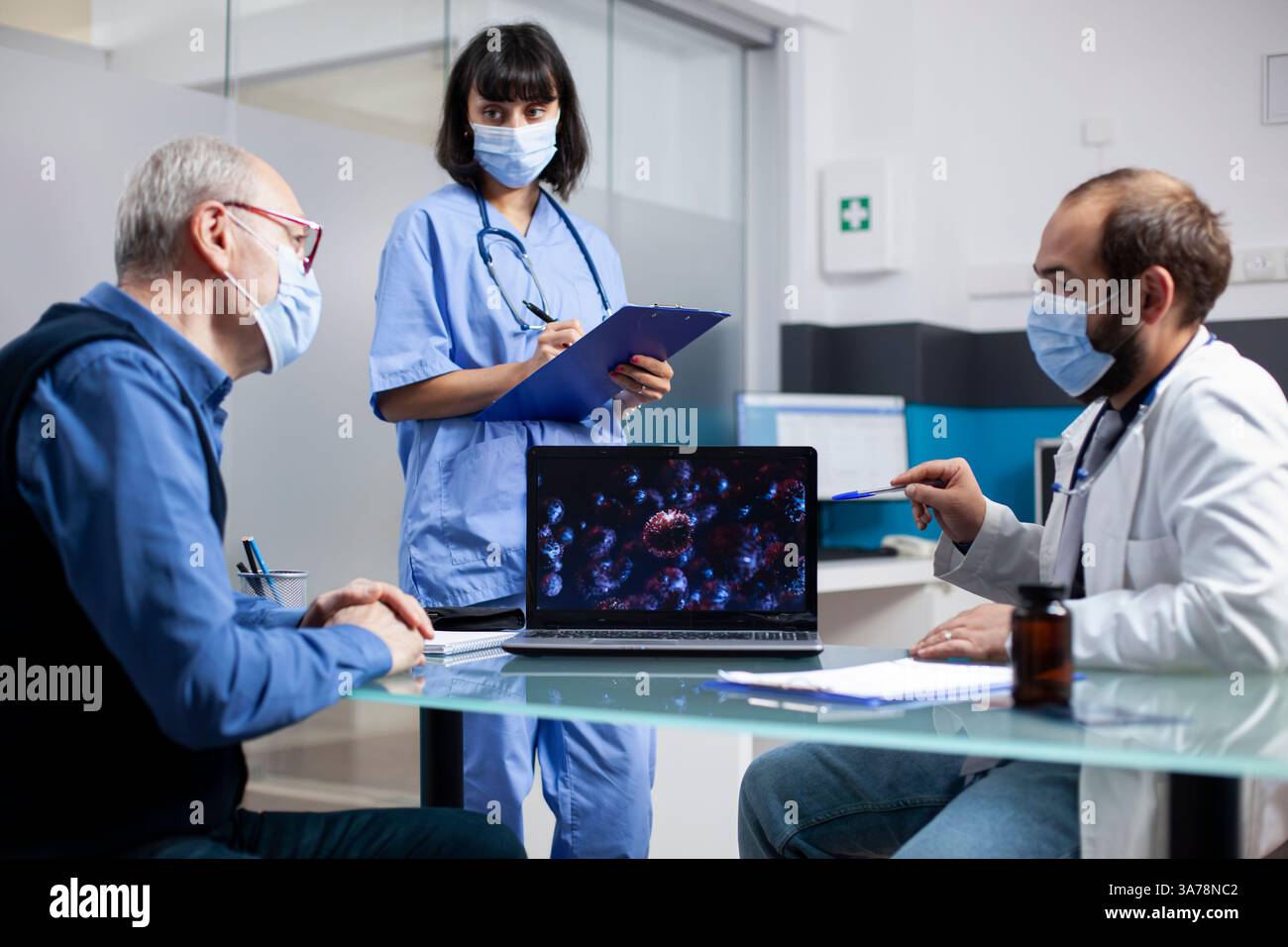 Doctor and old patient analyze digital display of microscopic germs as ...