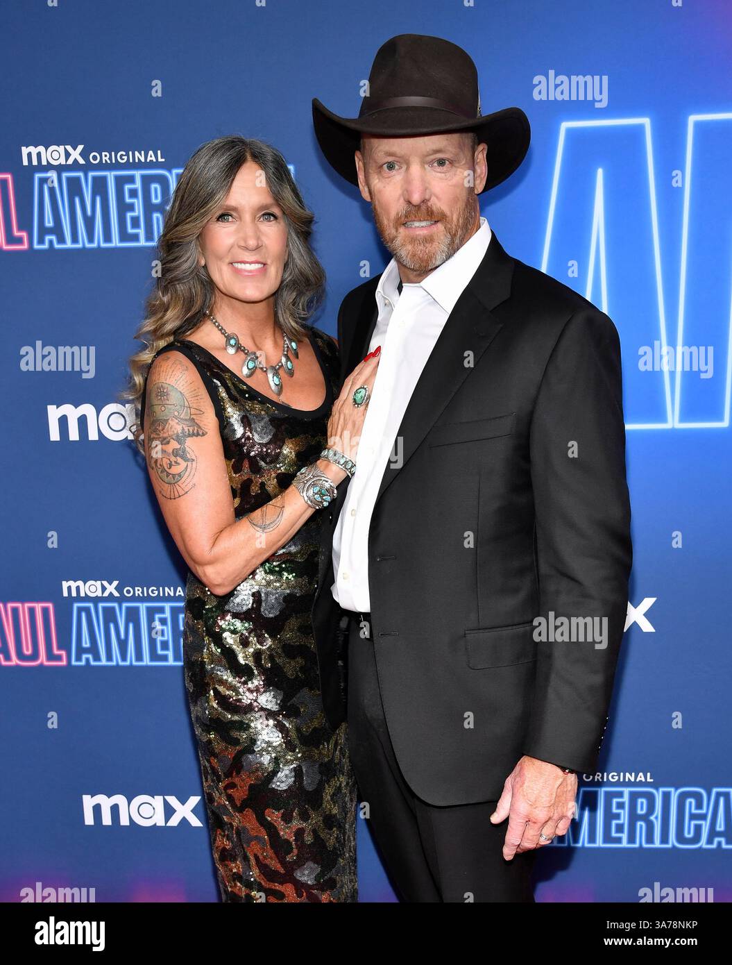 Greg Paul, right, and wife Hawkwind Kelly attend the Max Original ...