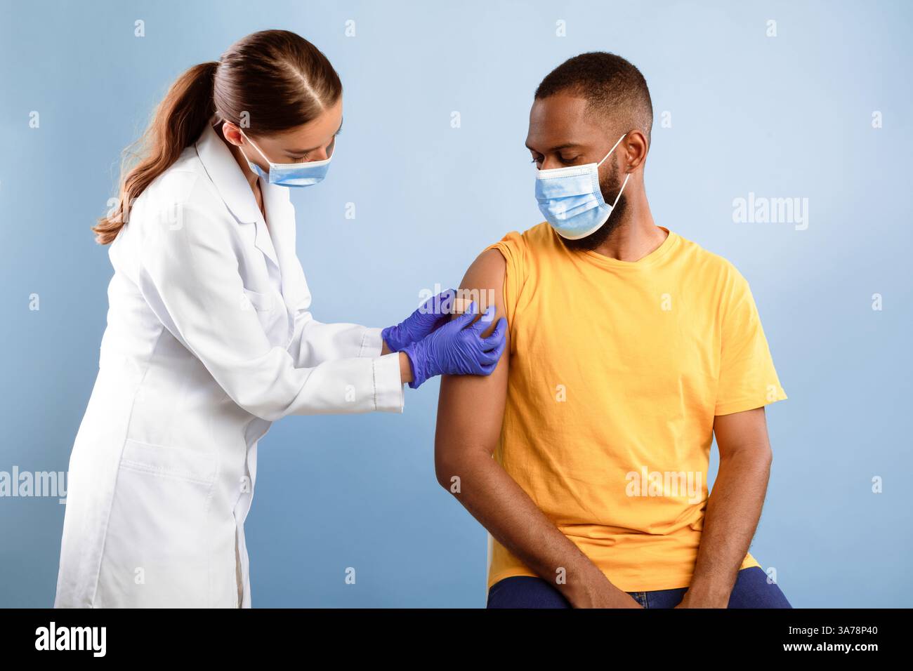Nurse putting band aid hi-res stock photography and images - Alamy