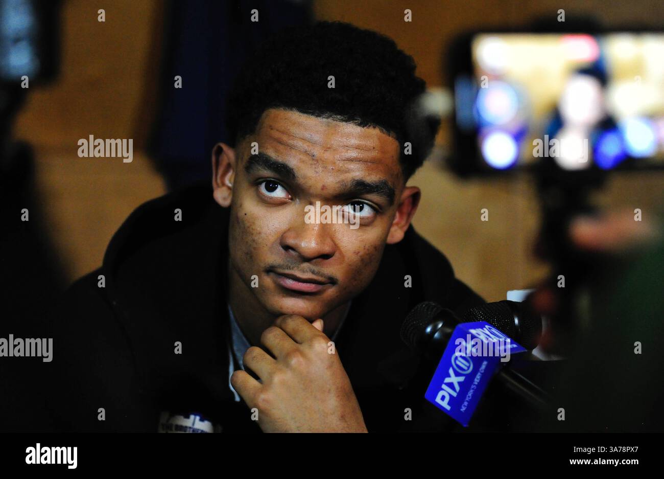 Newark, USA. 26th Mar, 2025. Duke's Caleb Foster gives an interview in ...
