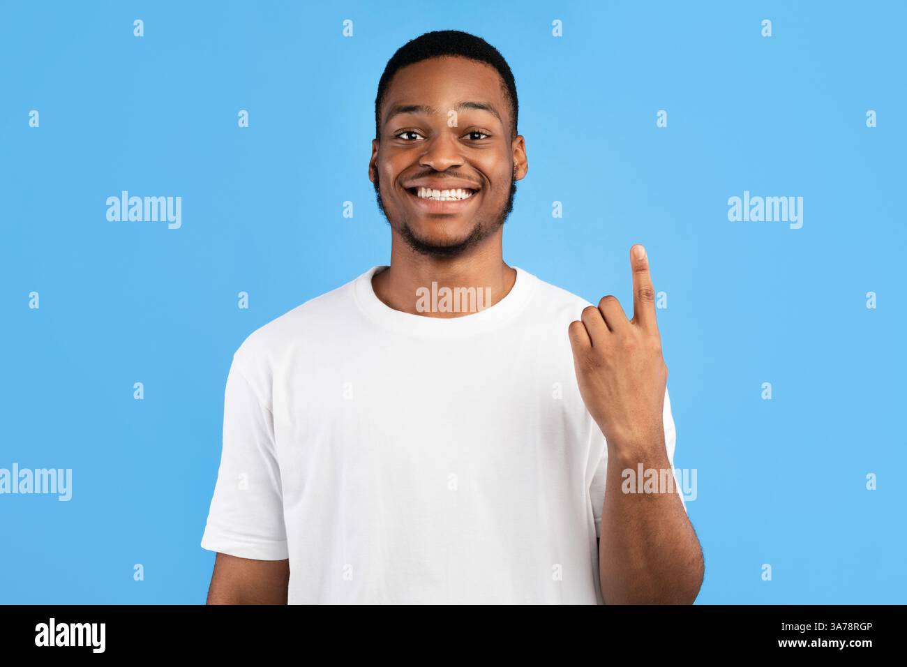 African Man Showing Number One Counting On Fingers, Studio Shot Stock ...