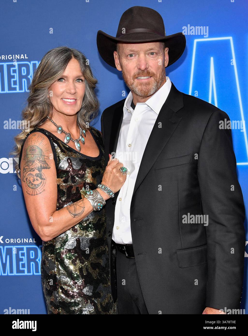 Greg Paul, right, and wife Hawkwind Kelly attend the Max Original ...