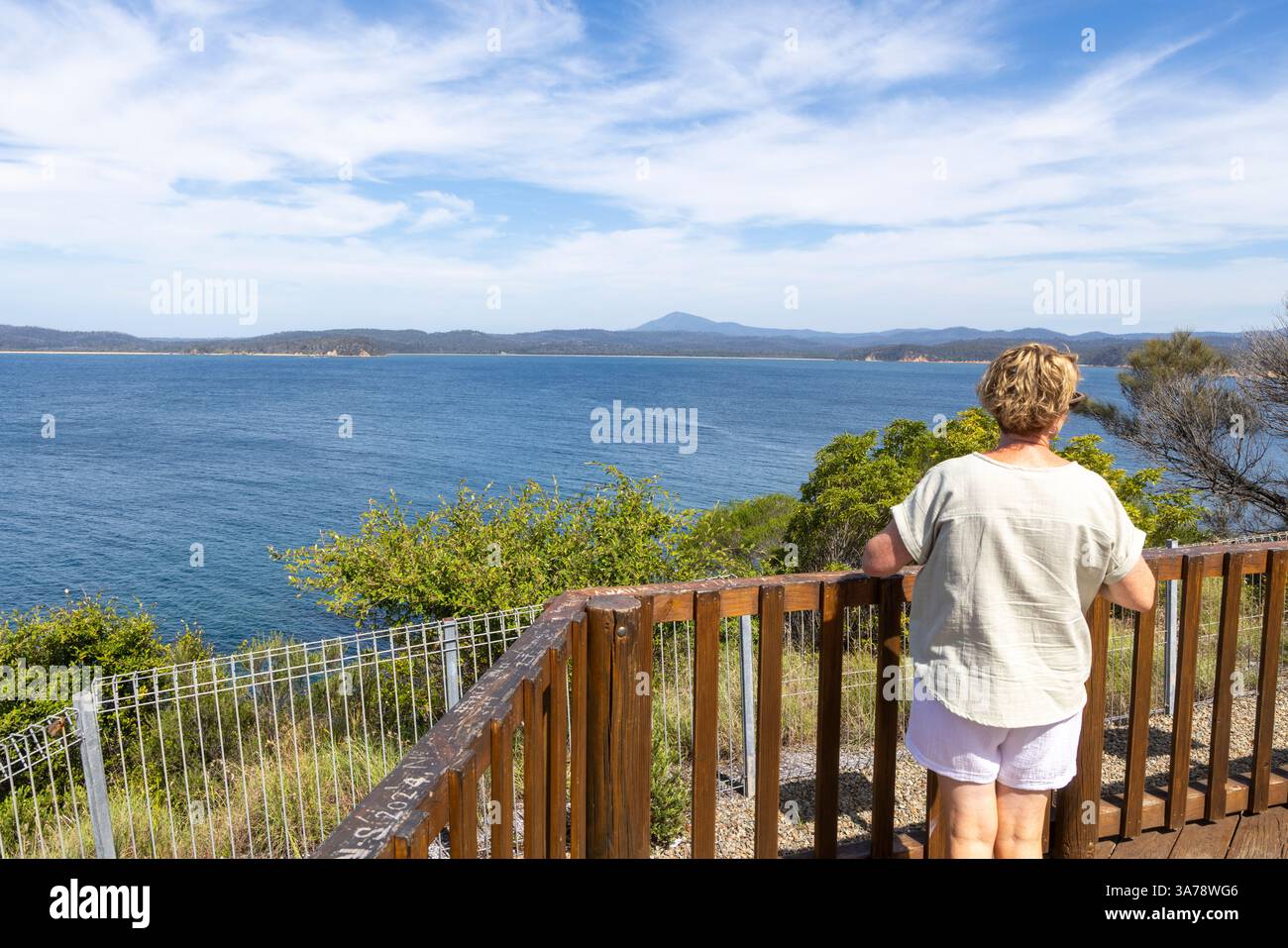 Eden lookout Rotary park, model released woman enjoys the view across ...