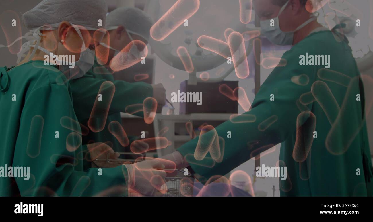 Multiple blood vessels floating against team of surgeons performing ...