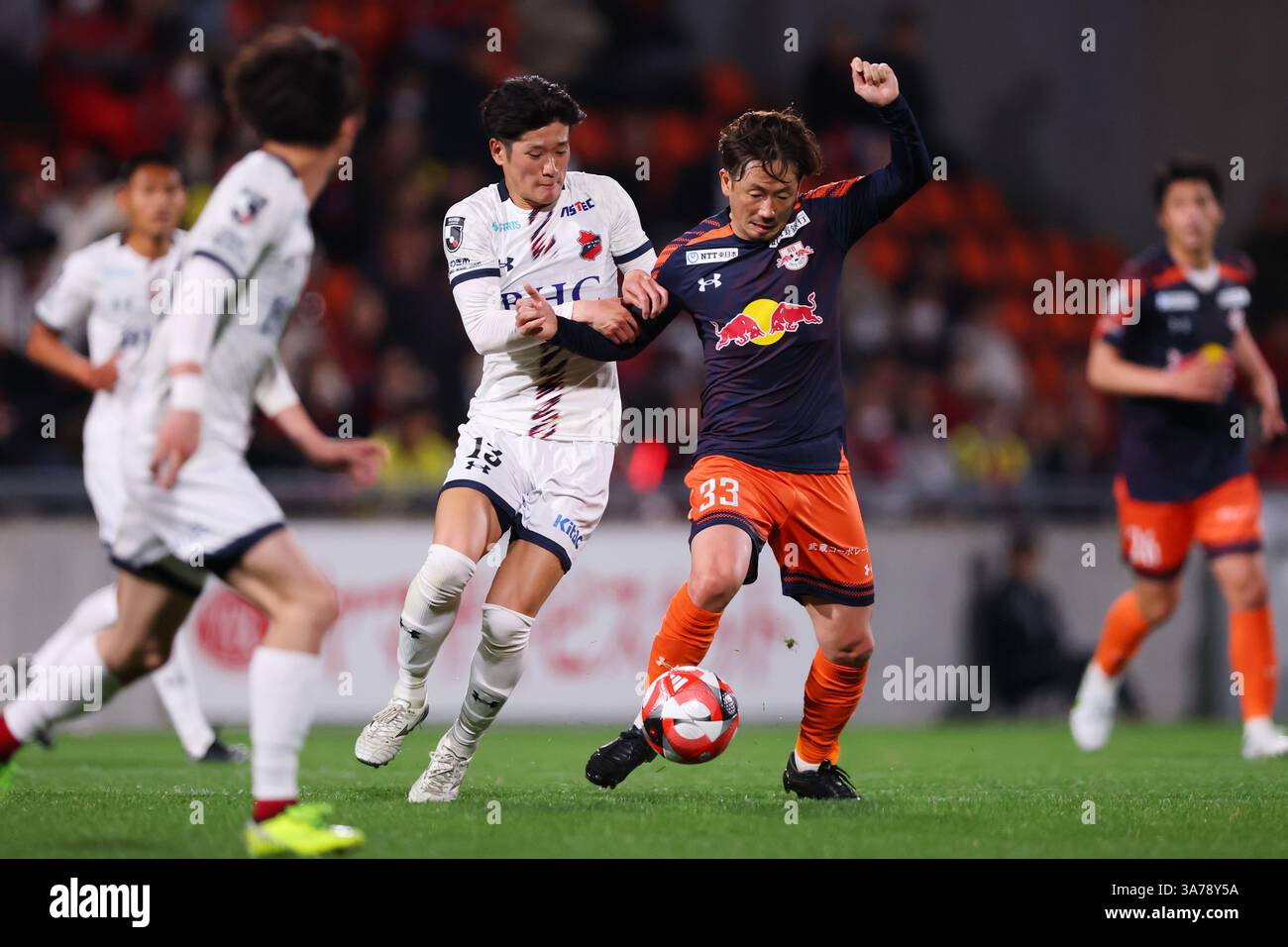 NACK5 Stadium Omiya, Saitama, Japan. 26th Mar, 2025. (L to R) Haruto Murakami (Iwaki FC), Takuya ...