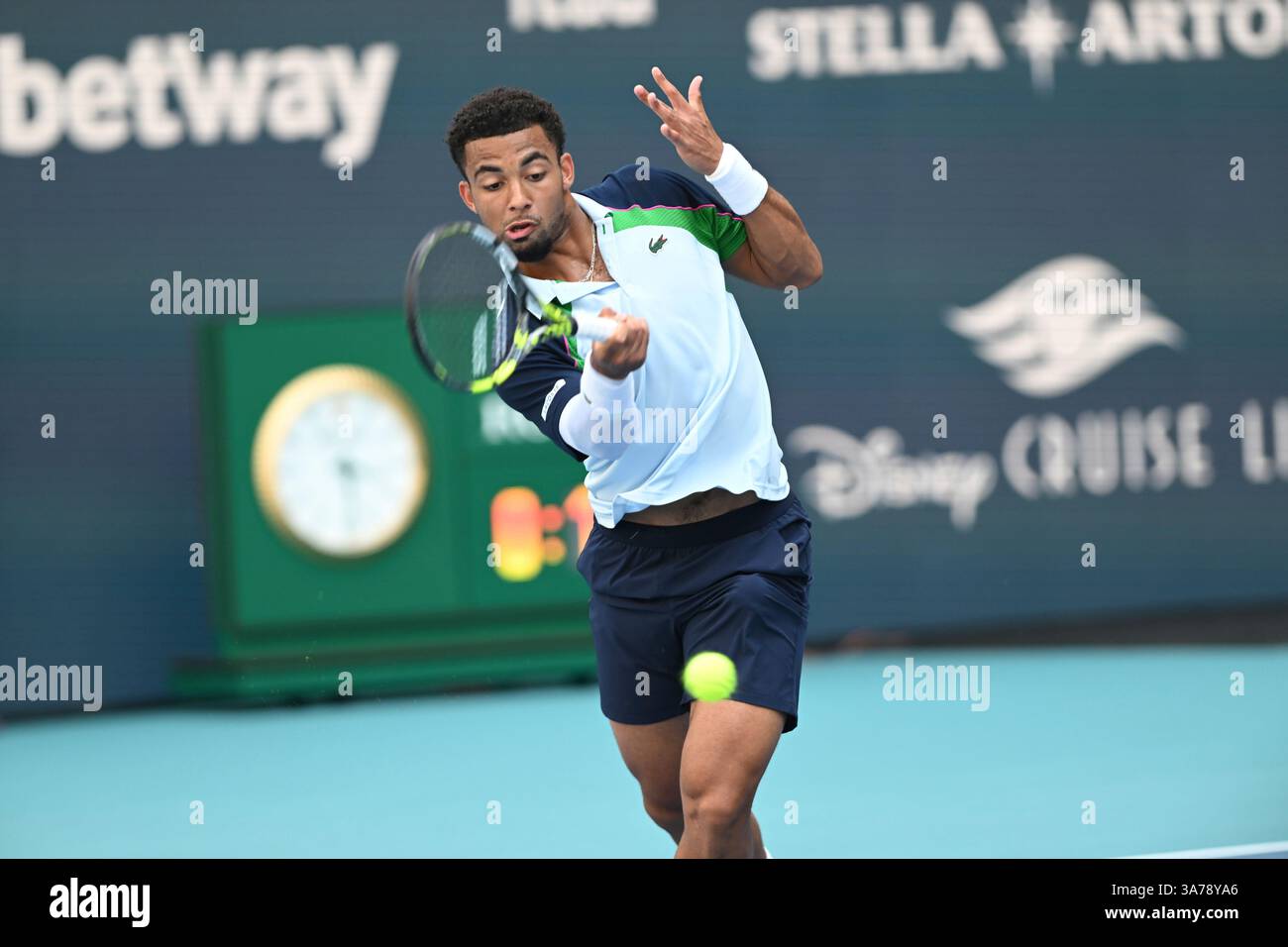 MIAMI GARDENS, FL - MARCH 26: Arthur Fils (FRA) iin action during the ...