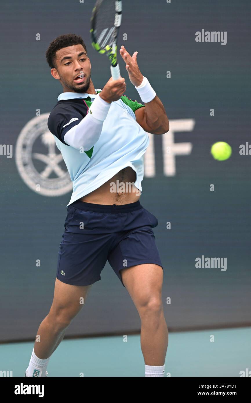 MIAMI GARDENS, FL - MARCH 26: Arthur Fils (FRA) iin action during the ...