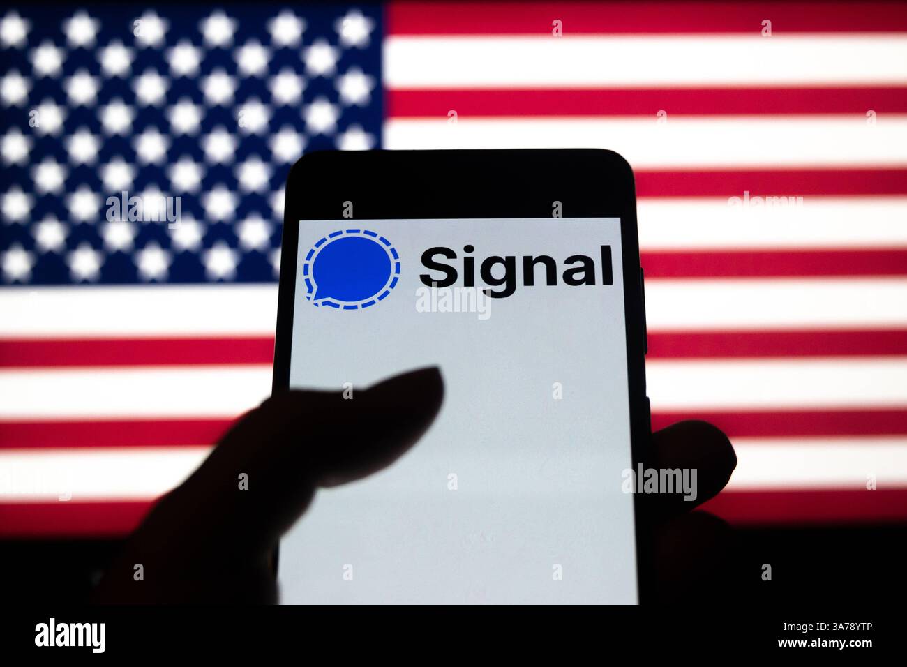 Signal app logo and U.S. flag are seen in this illustration Copenhagen ...