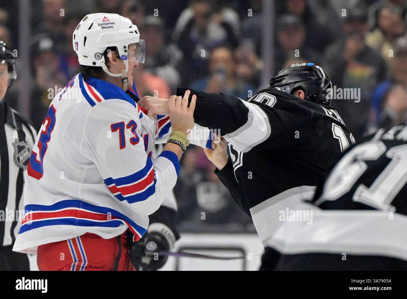 New York Rangers center Matt Rempe, left, and Los Angeles Kings left ...