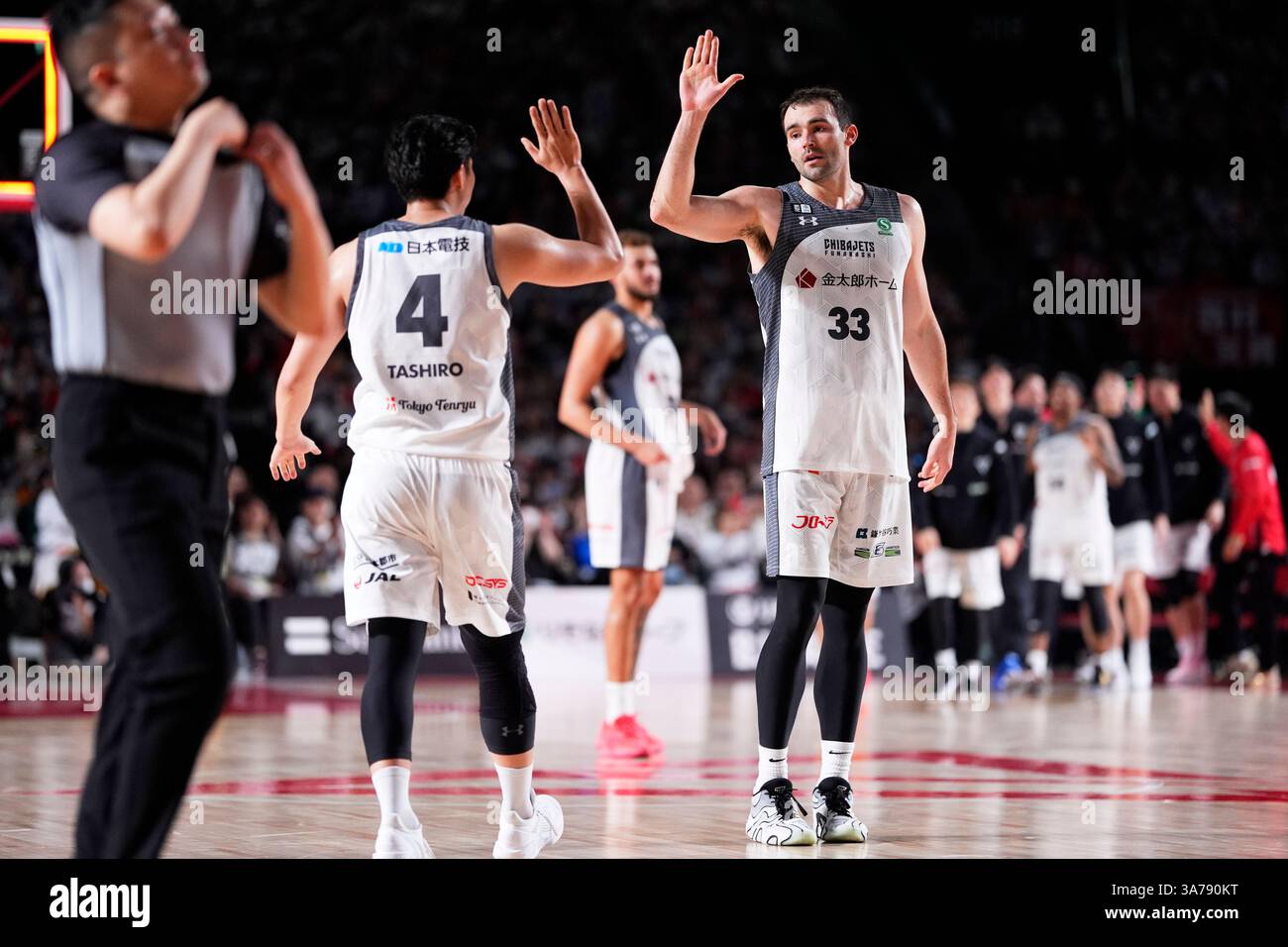 Chiba, Japan. 26th Mar, 2025. (L-R) Naoki Tashiro, John Mooney (Jets ...
