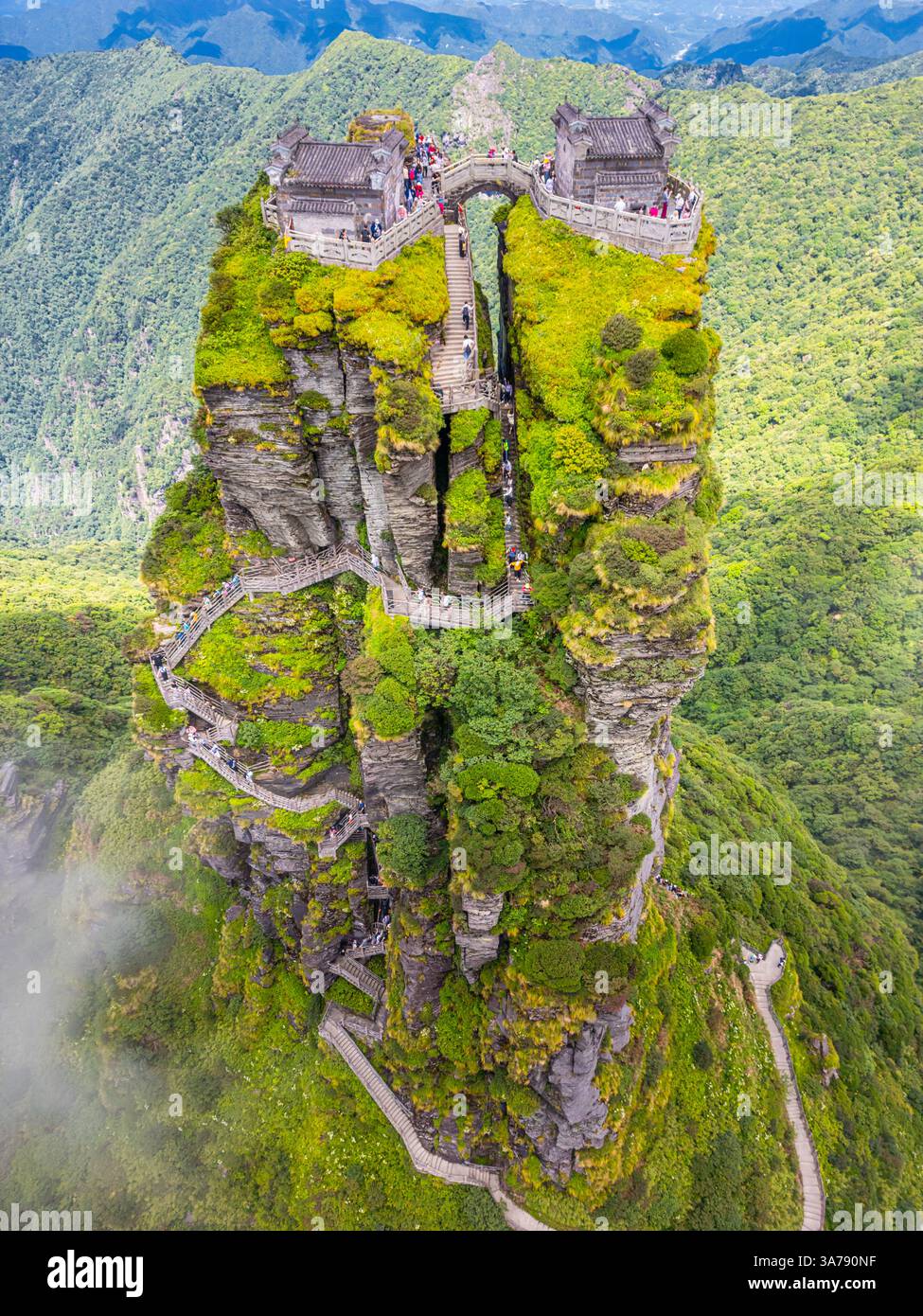 Close up on Fanjingshan mountain with a little cloud surrounding its ...